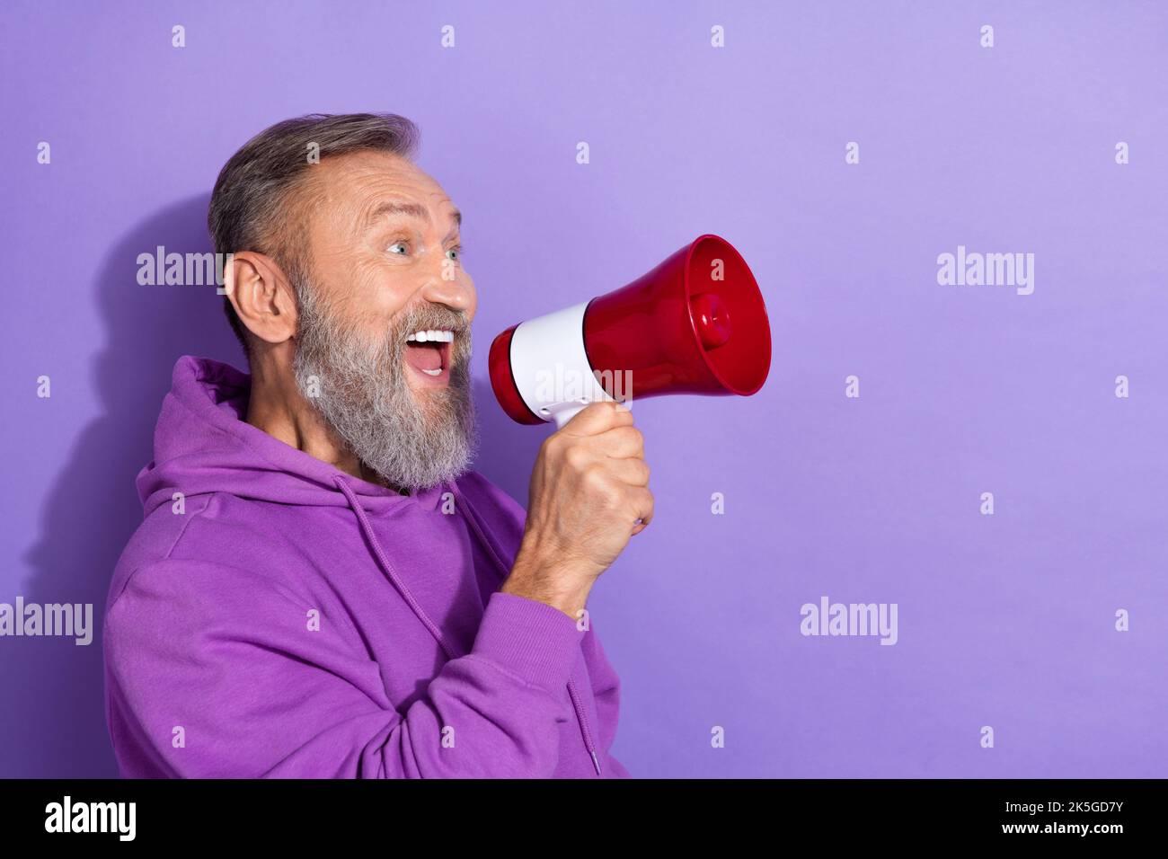 Photo of pensioner man with white gray hair dressed purple hoodie loud ...