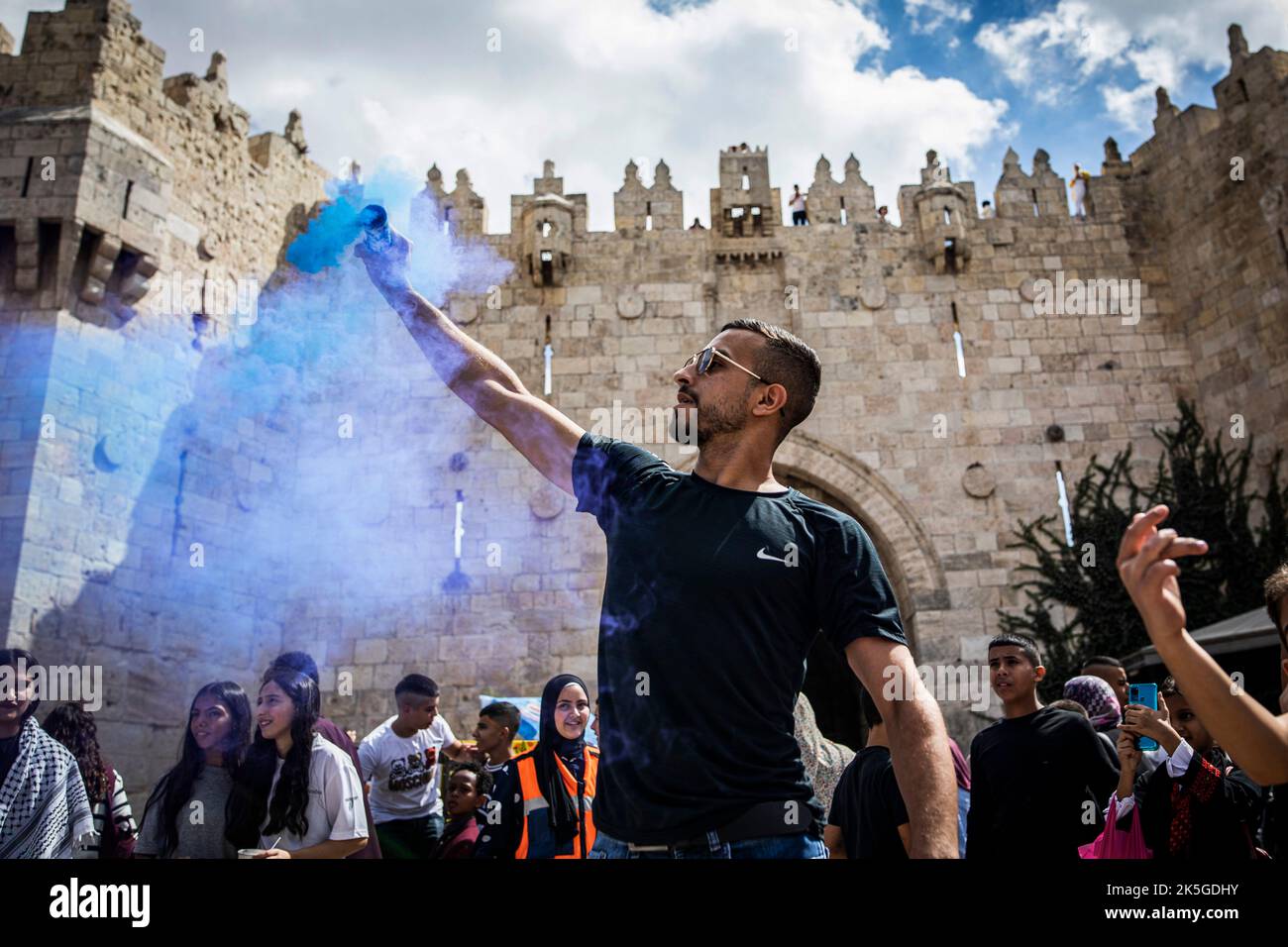 Jerusalem, Israel. 08th Oct, 2022. A man holds a smoke bomb during a ...