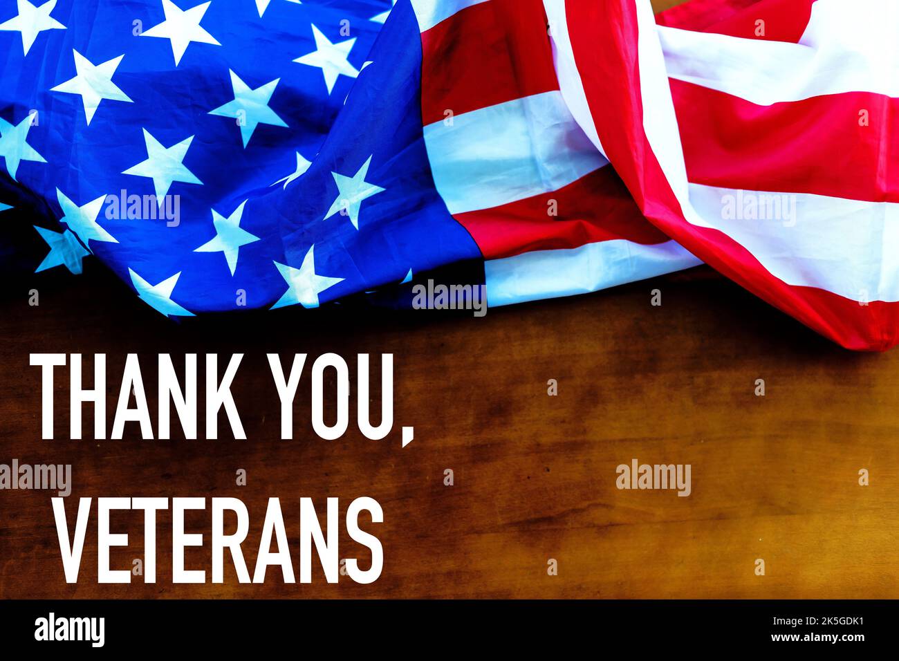 the text thank you veterans and a flag of the United States, on a ...
