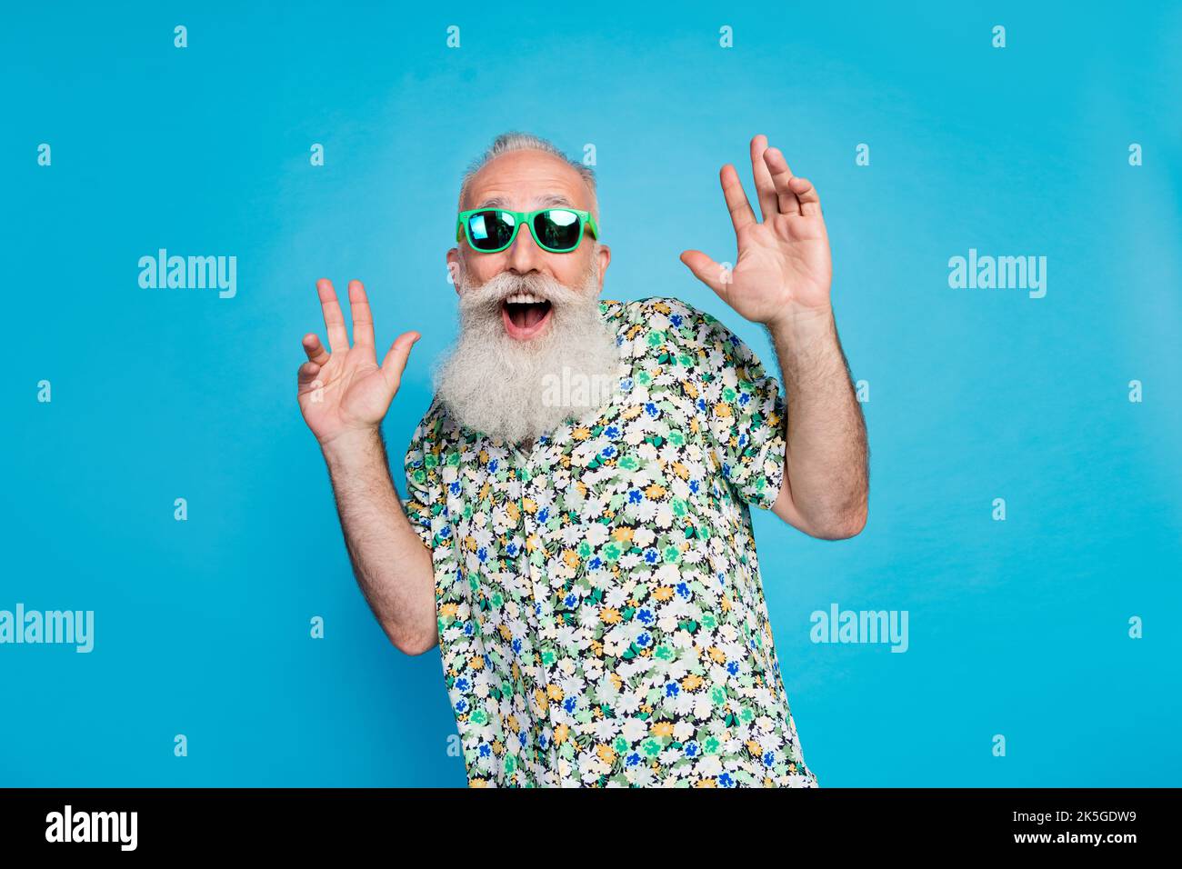 Photo of old senior aged gray bearded hairstyle macho man wear tropical ...