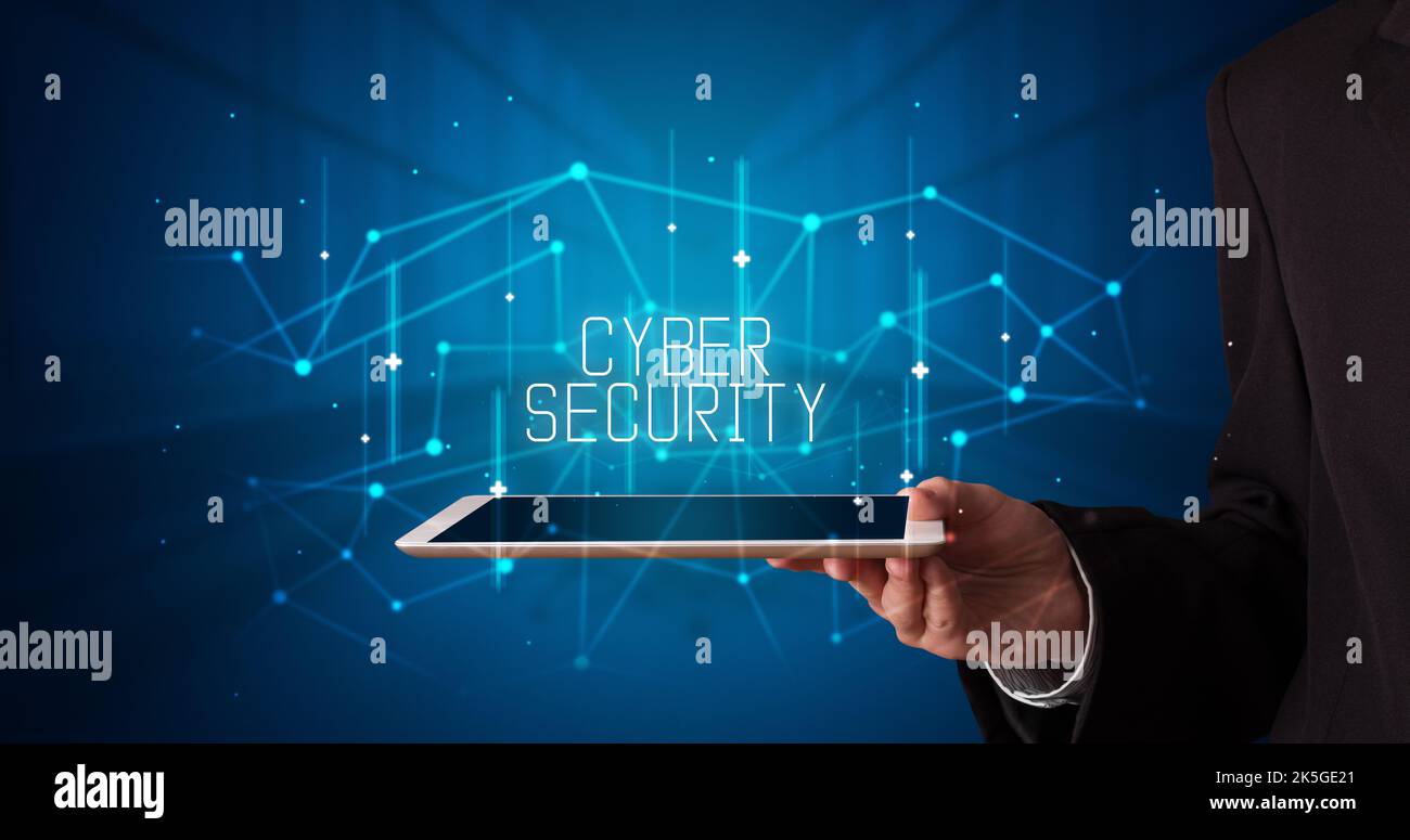 Person holding tablet, security concept Stock Photo - Alamy