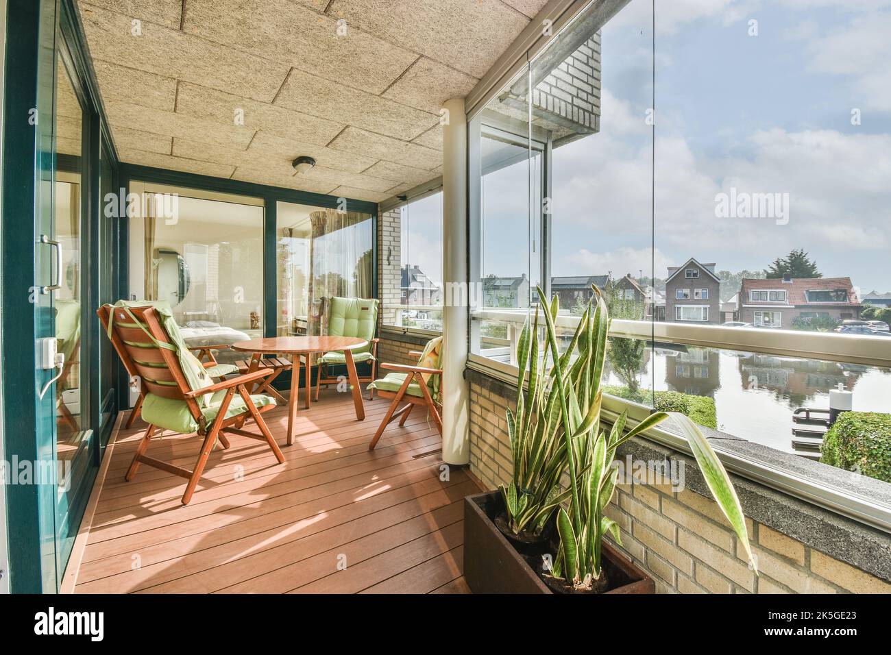 Panoramic view of trees from small balcony Stock Photo - Alamy