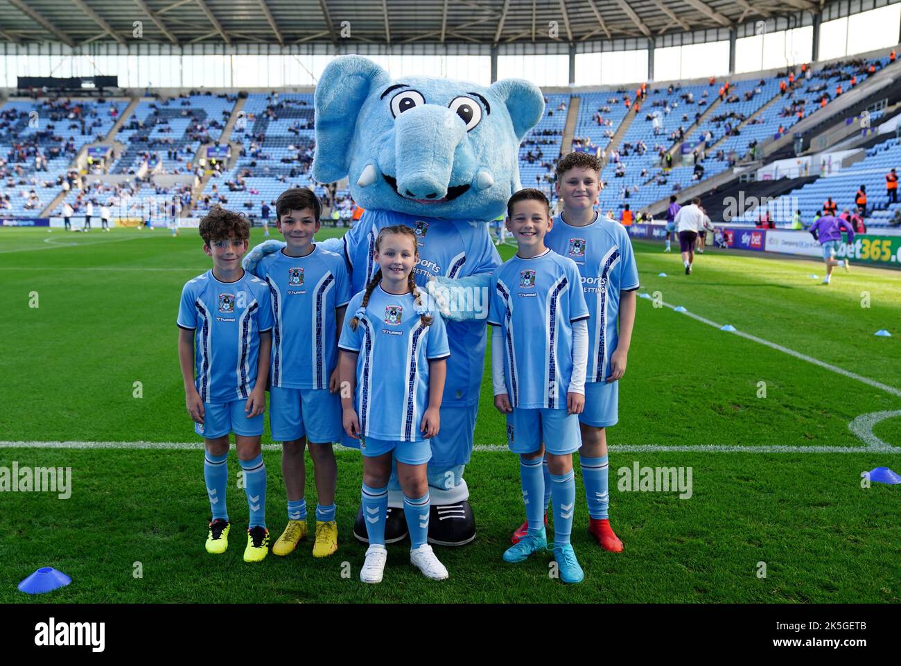 Coventry City mascot Sky Blue Sam poses with the match day mascots ...