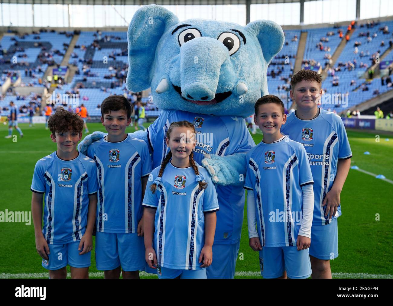 Coventry City mascot Sky Blue Sam poses with the match day mascots ...