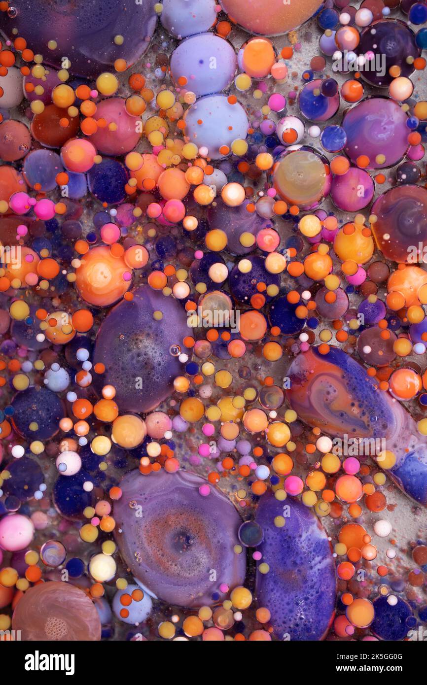 Acrylic paint balls abstract texture. Bright colors fluid, flowing ...