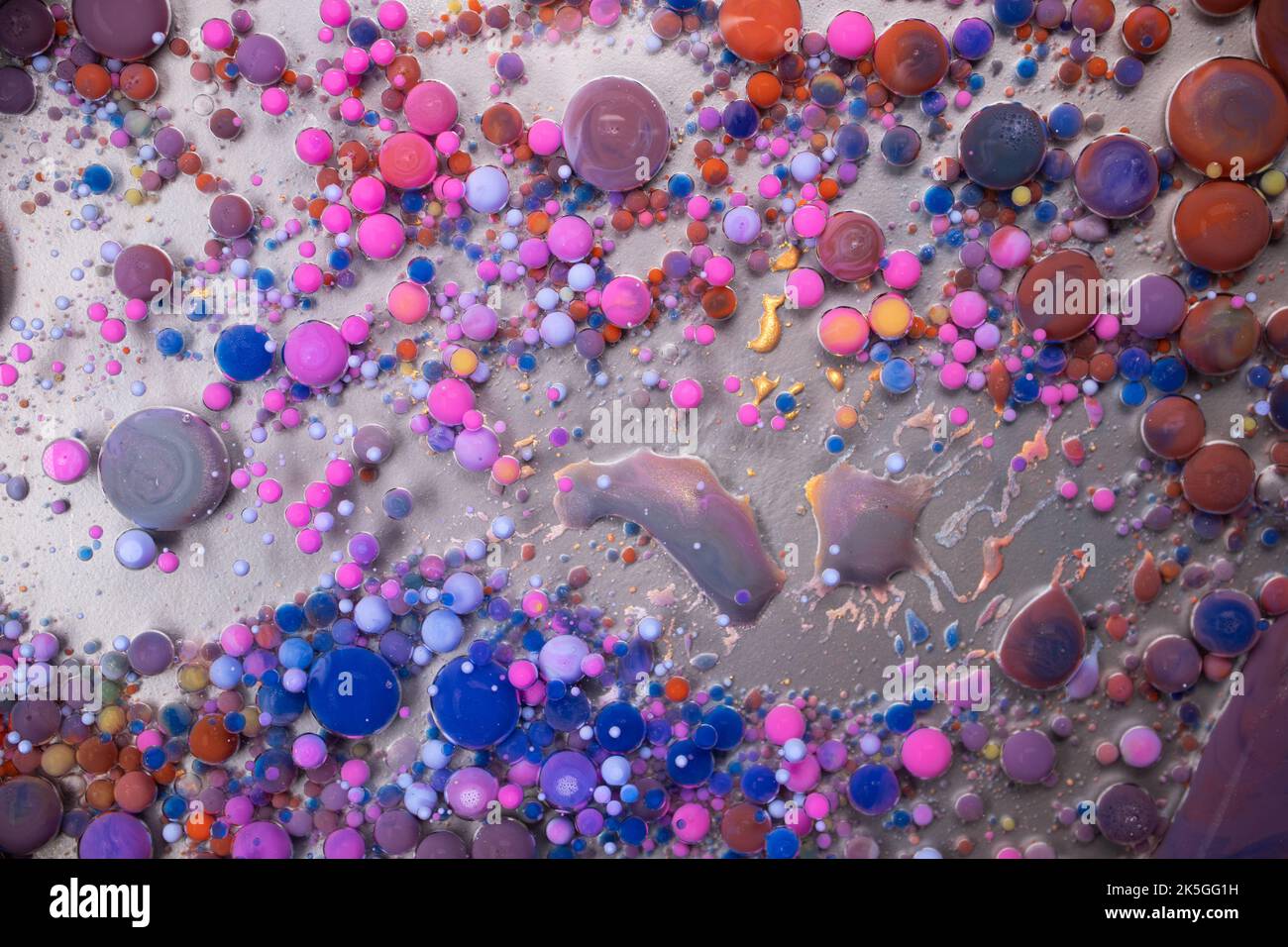 Acrylic paint balls abstract texture. Bright colors fluid, flowing ...