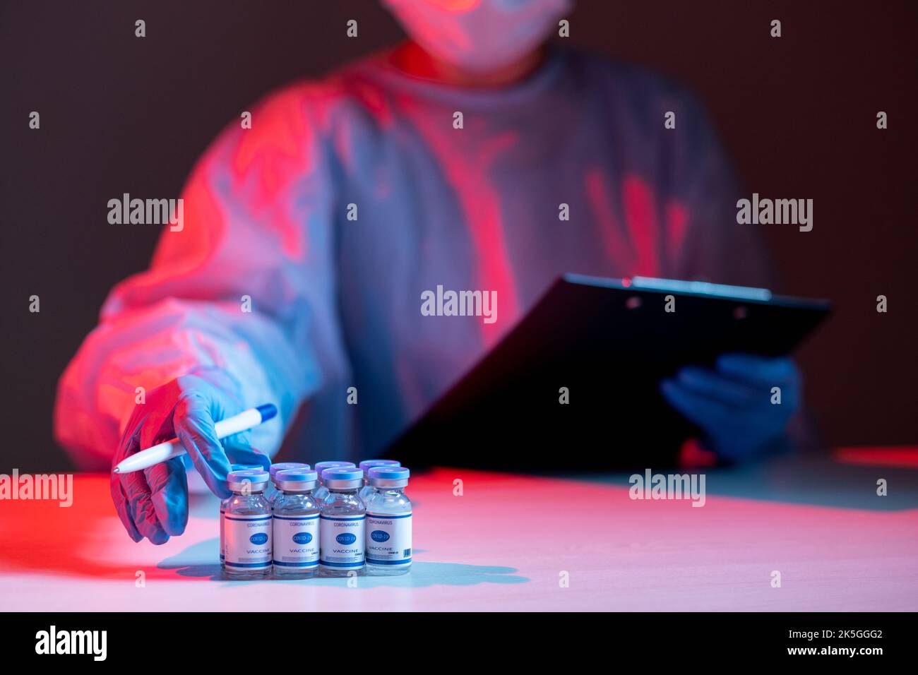 Vaccine record. Coronavirus immunization. Lab research. Female ...