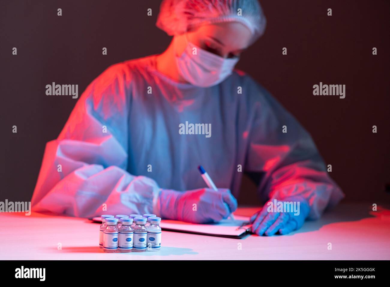 Immunization record. Covid-19 vaccine. Inoculation certificate. Female ...