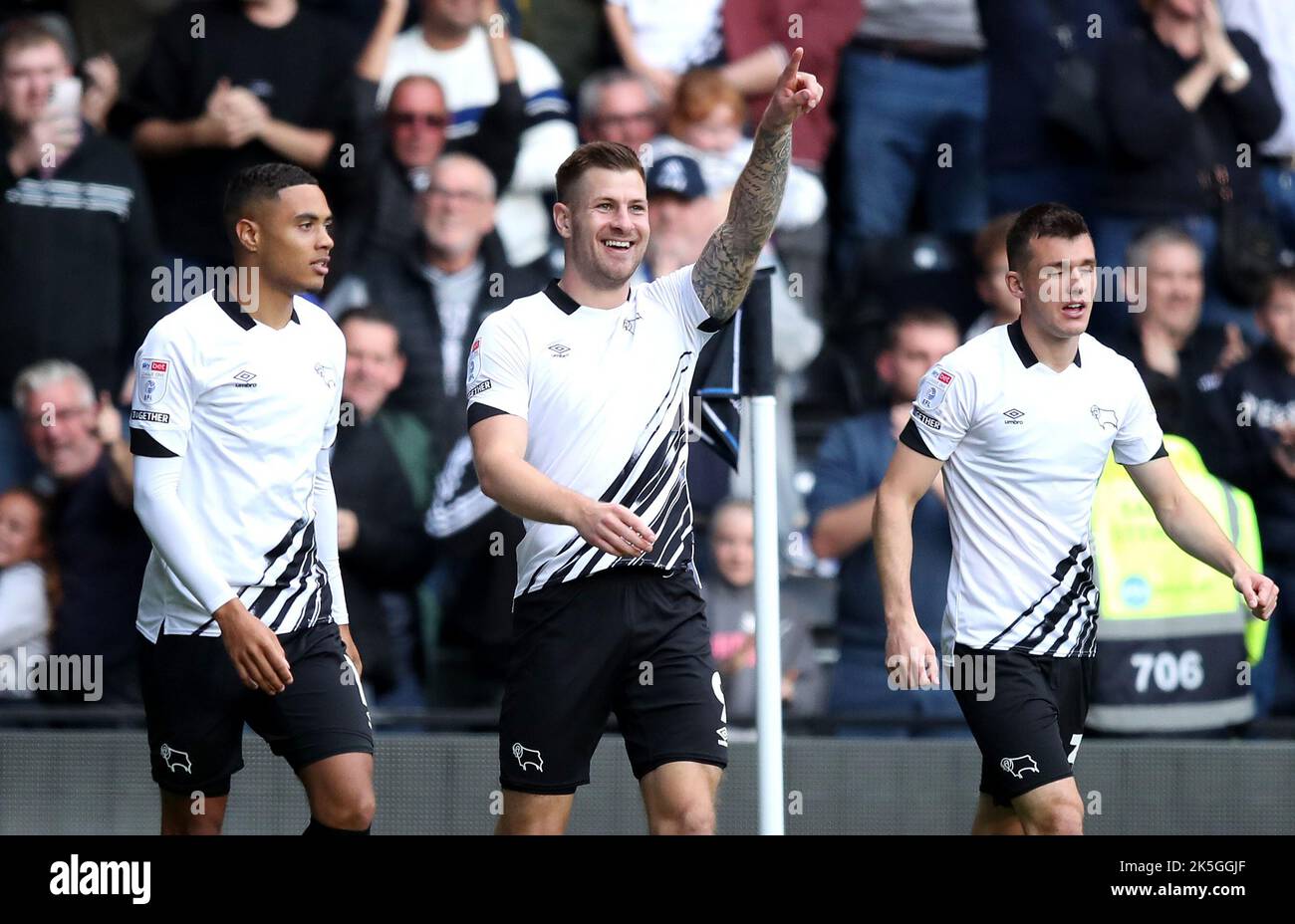 Derby County's James Collins (centre) celebrates scoring their side's ...