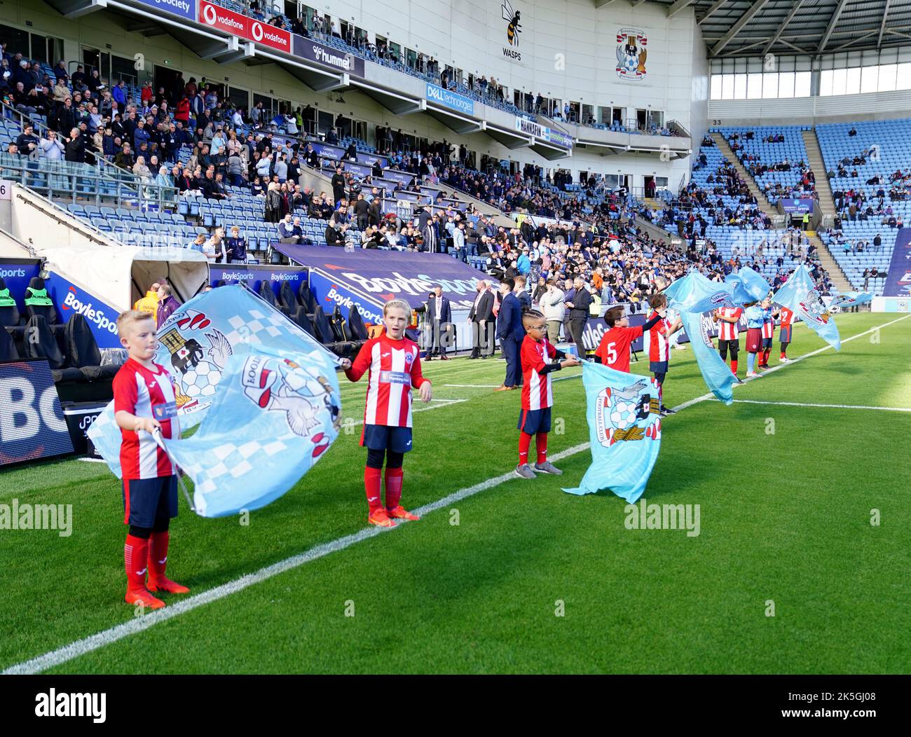 The Guard of Honour wave flags pitch side before the Sky Bet ...