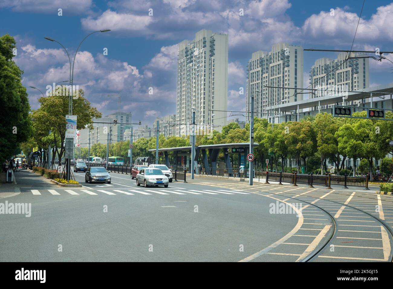 Suzhou, Jiangsu, China. Street Traffic and High-rise Apartment Buildings Stock Photo - Alamy