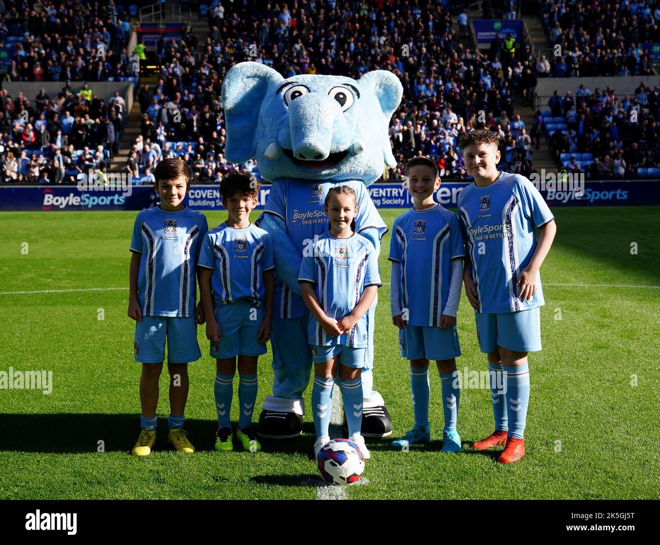 Coventry City mascot Sky Blue Sam poses with the match day mascots ...