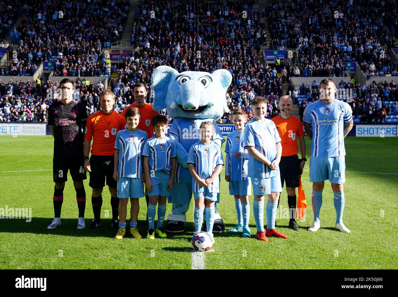 Coventry City mascot Sky Blue Sam poses with the match day mascots ...