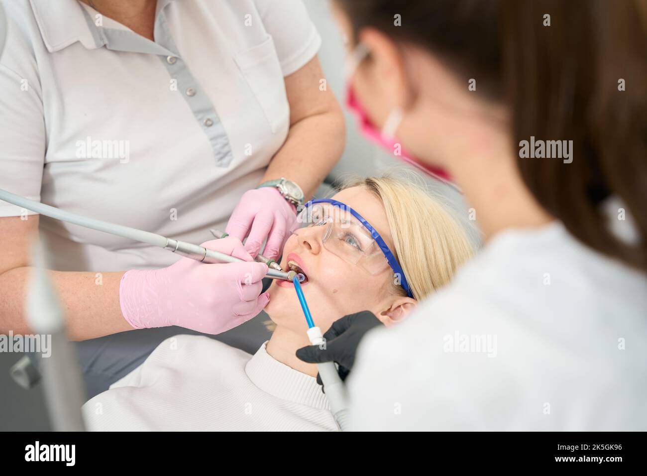 Lady in a dental chair hi-res stock photography and images - Alamy