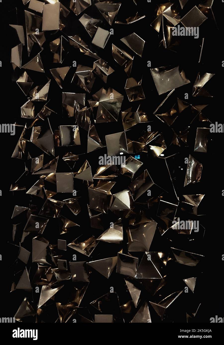 The dark backdrop with metallic geometric sharp forms Stock Photo - Alamy