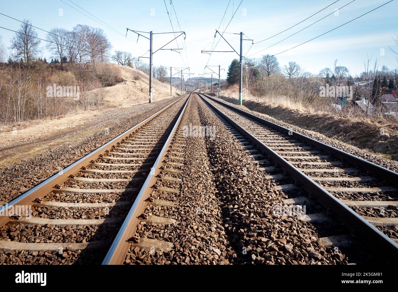 View of railway tracks in early spring Stock Photo - Alamy