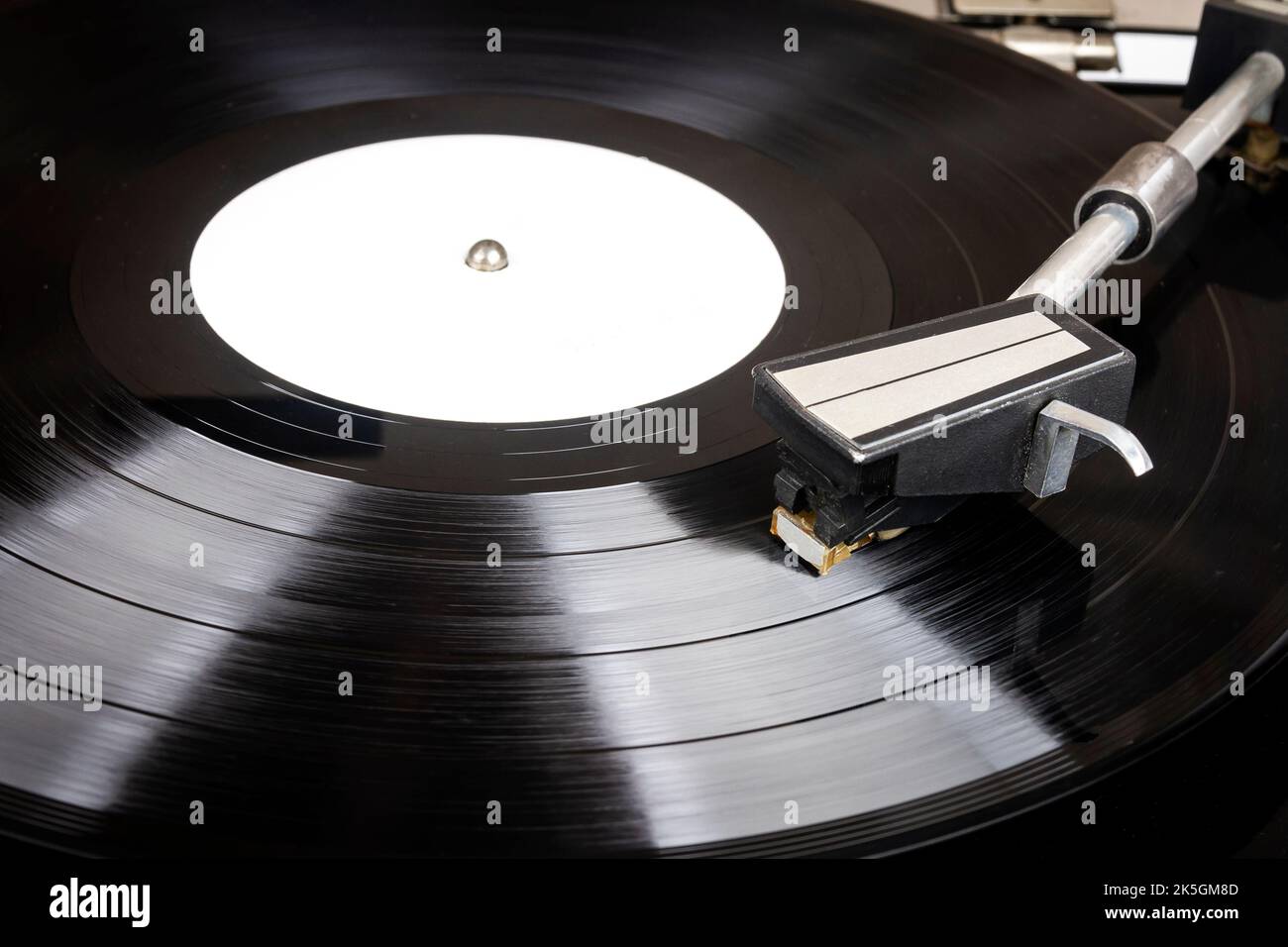 Close up of turntable needle on a vinyl record. Turntable playing vinyl ...