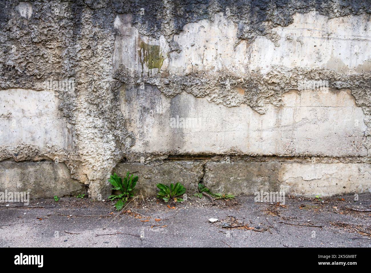 Aged weathered cracked concrete blocks wall background Stock Photo - Alamy