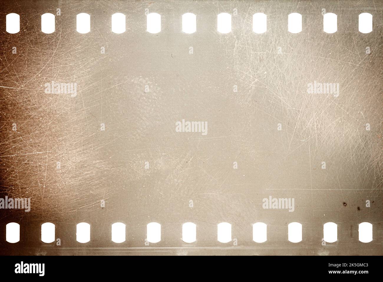 Dusty and grungy 35mm film texture or surface. Perforated scratched ...