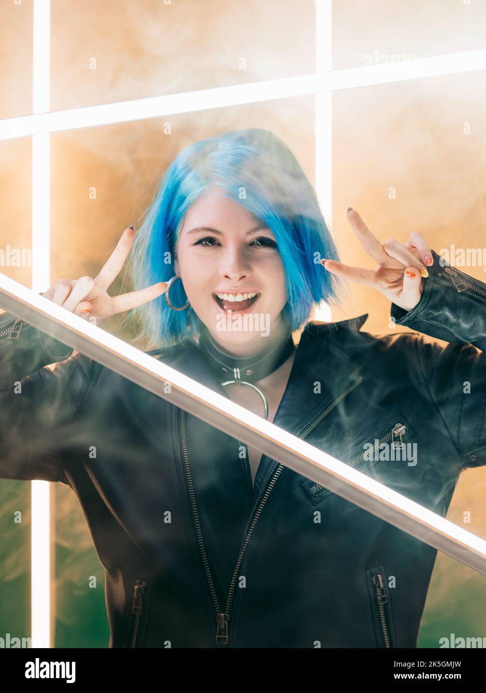 Peace gesture. Cyberpunk party. Synthwave style. Excited smiling woman ...