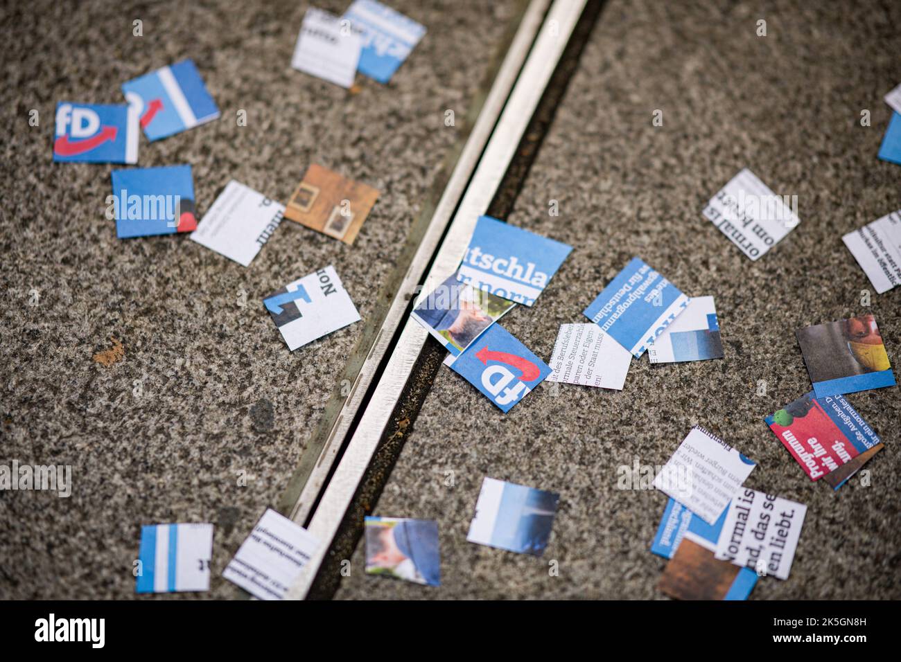 Berlin, Germany. 08th Oct, 2022. Shredded AfD flyers lie on the ground ...