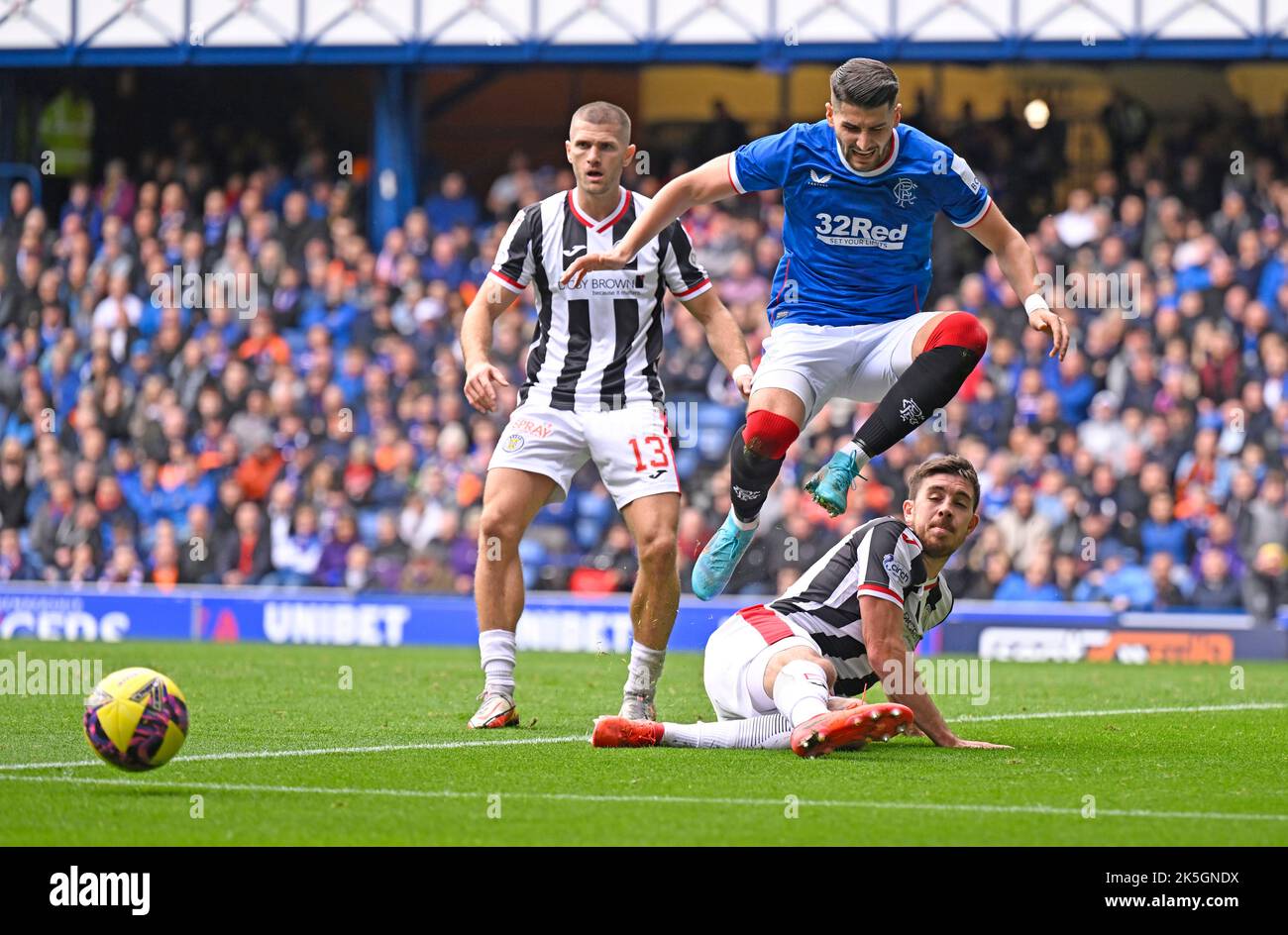 Glasgow, , 8th October 2022. Declan Gallagher of St Mirren brings down ...
