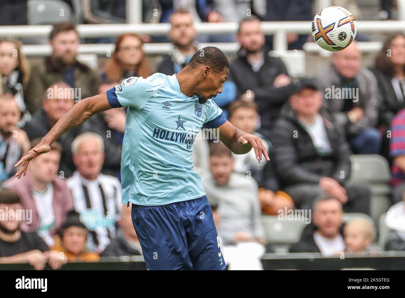 Ethan Pinnock #5 of Brentford heads clear during the Premier League ...