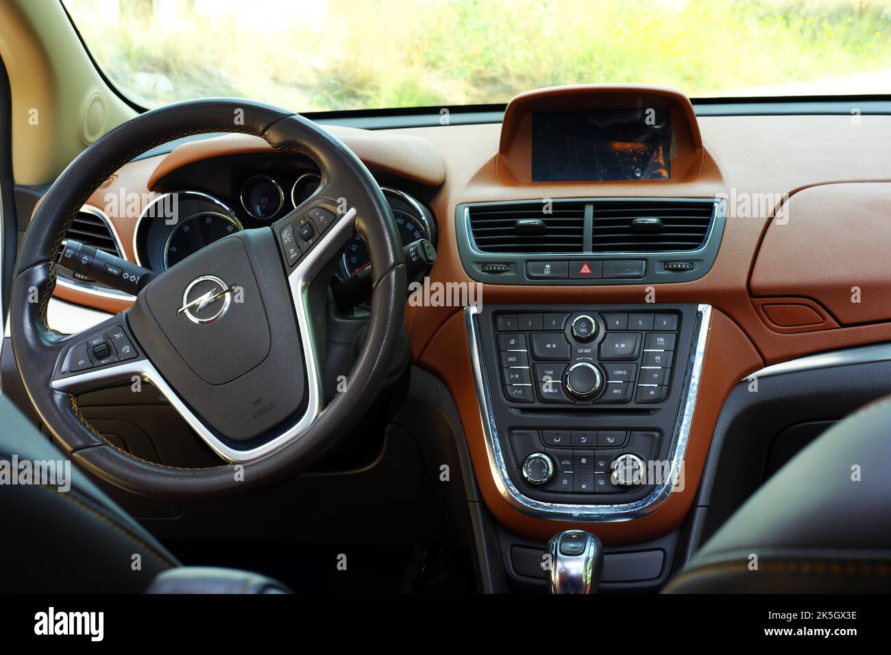 Steering wheel and front panel of luxury SUV Opel Mokka Stock Photo - Alamy