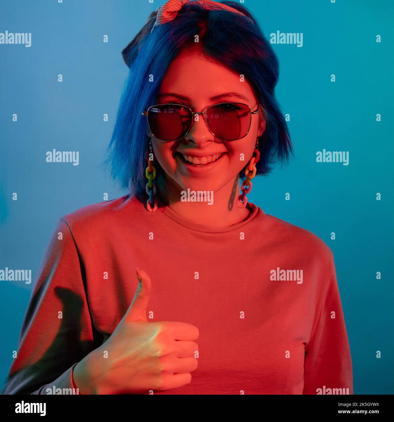 Approval gesture. Agree sign. Excellent idea. Red neon light joyful ...