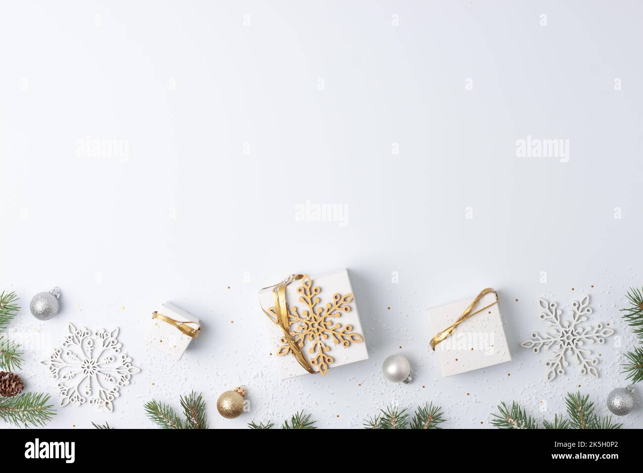 Christmas decorations with gifts on white background. Flat lay, copy ...