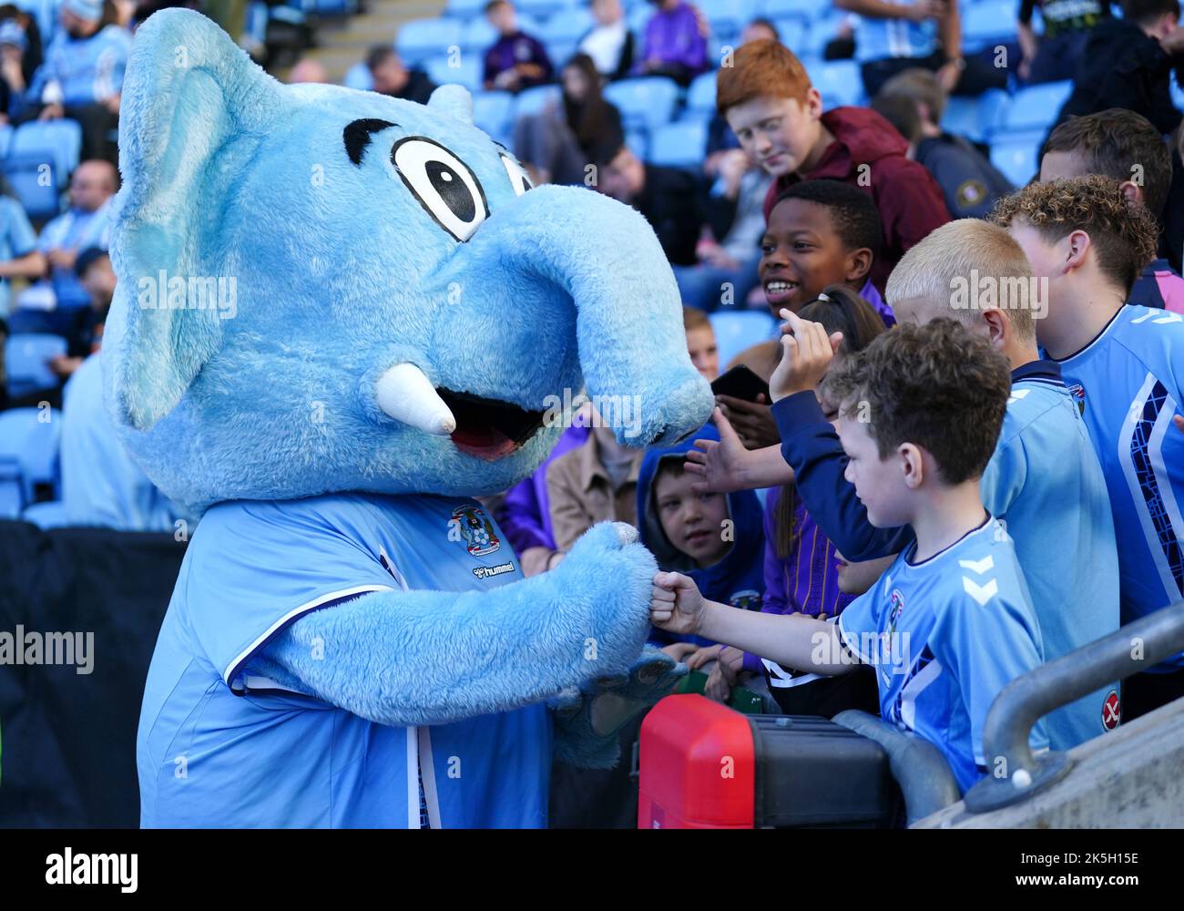 Coventry City mascot Sky Blue Sam meets with fans at halftime during ...