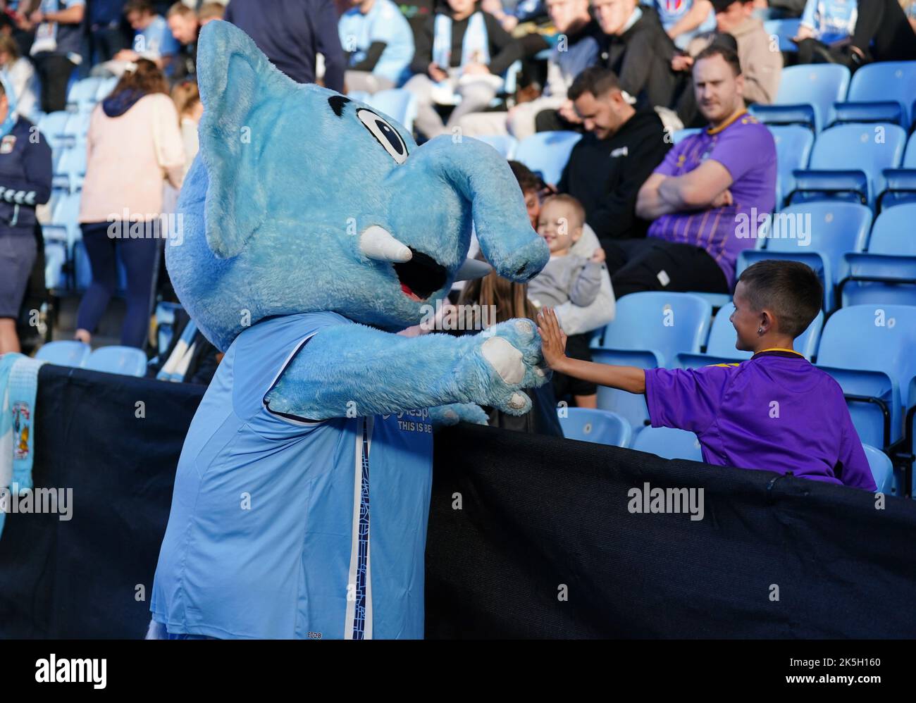 Coventry City mascot Sky Blue Sam meets with fans at halftime during ...