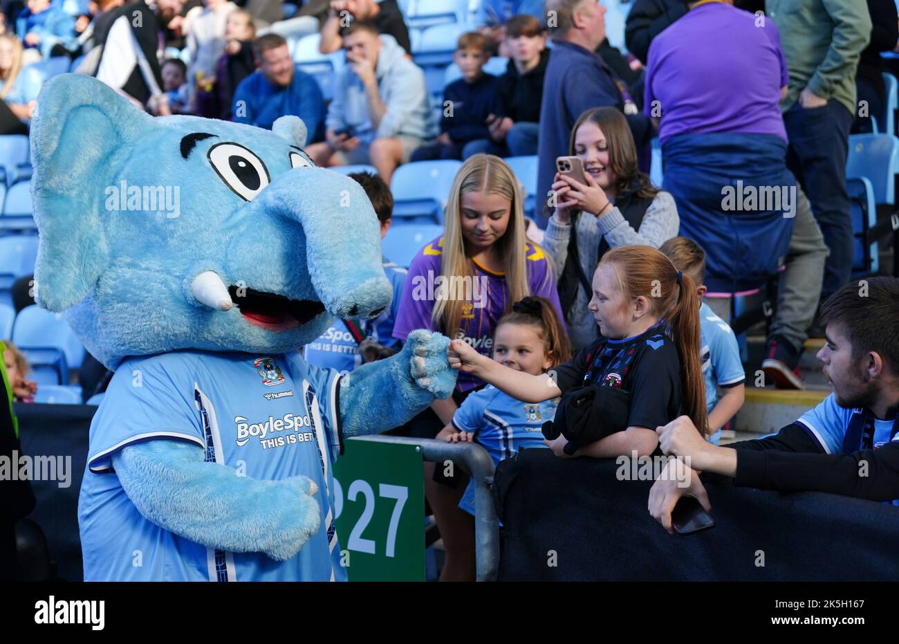 Coventry City mascot Sky Blue Sam meets with fans at halftime during ...