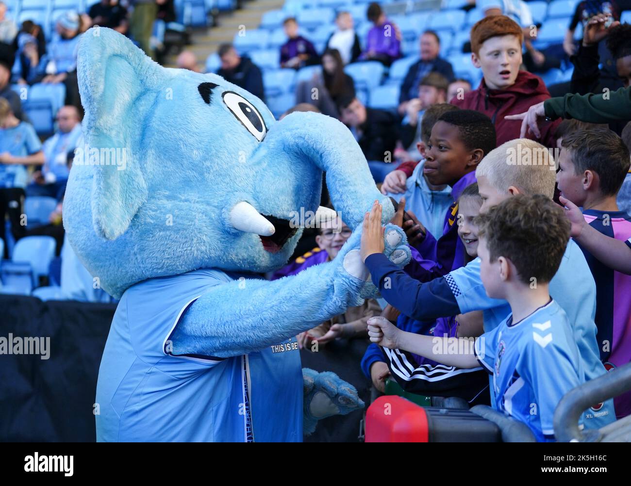 Coventry City mascot Sky Blue Sam meets with fans at halftime during ...