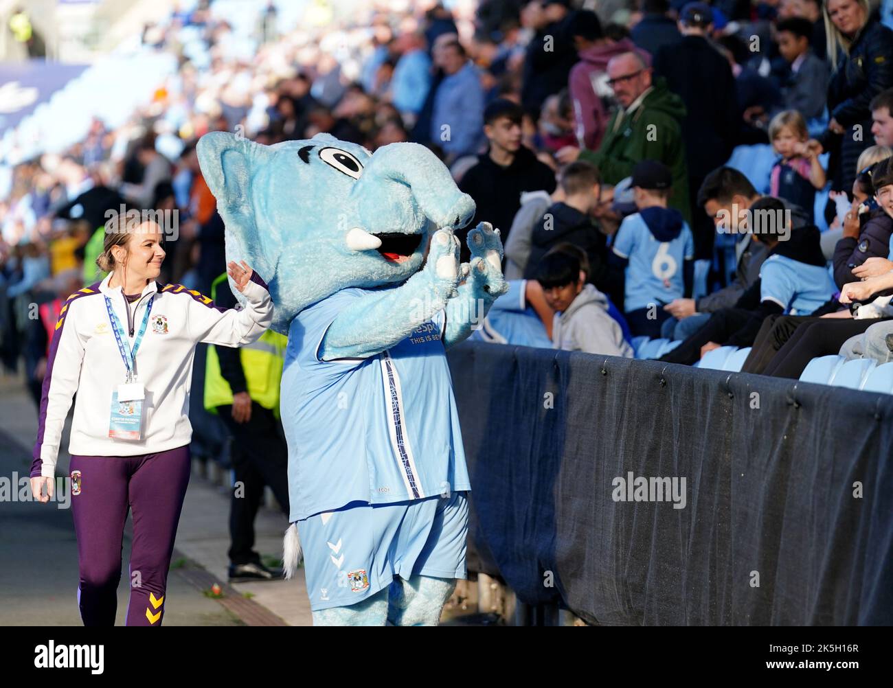 Coventry City mascot Sky Blue Sam meets with fans at halftime during ...