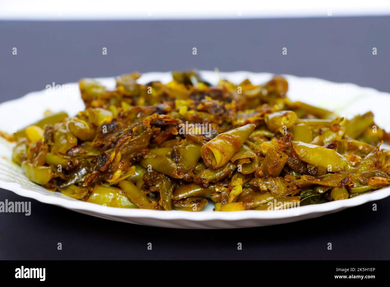 Closeup Image Of Kerala Style Beans Thoran In White Plate Stock Photo ...