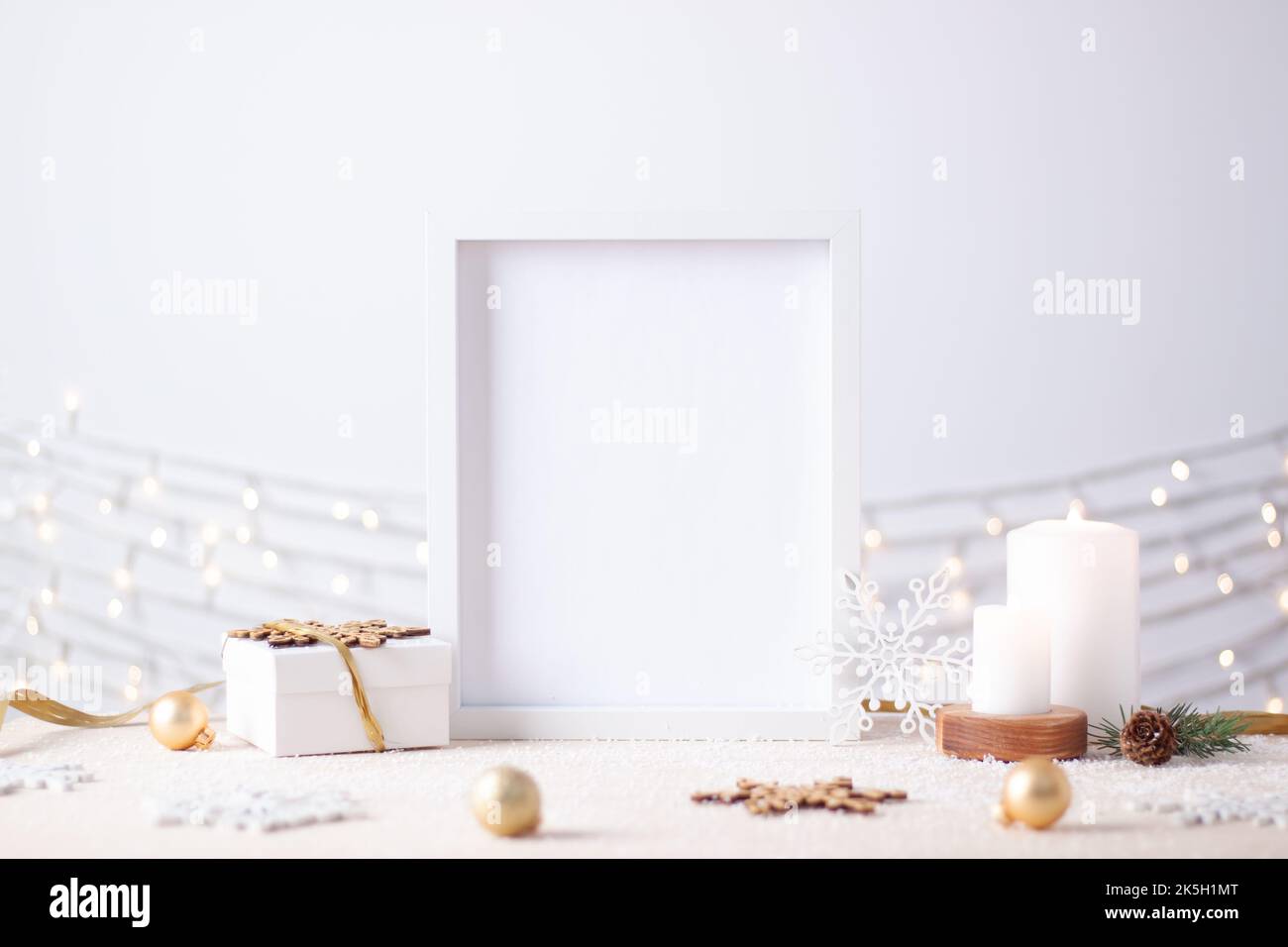 Christmas decorations with white frame and gift on white background ...