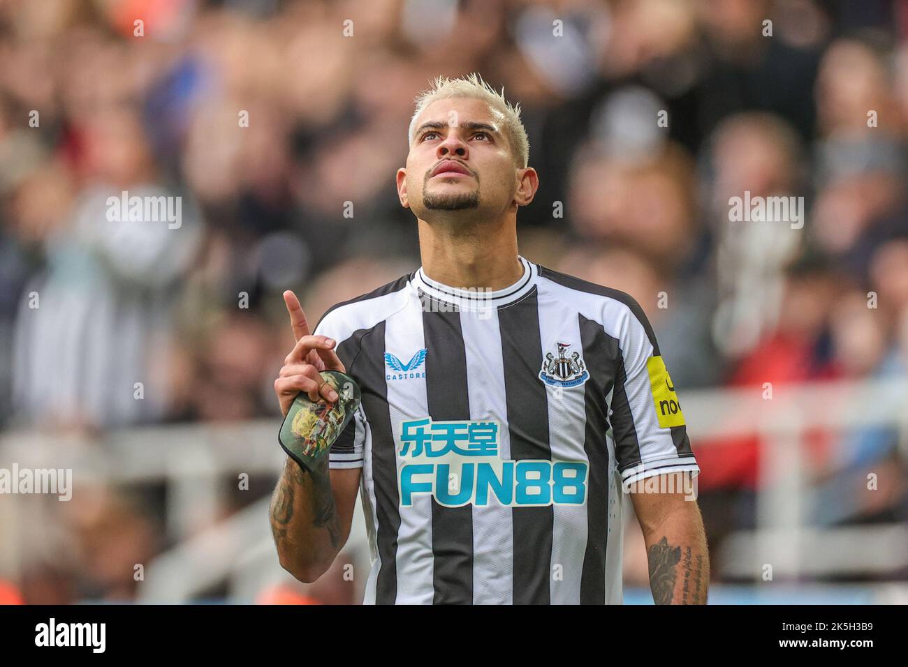 Bruno Guimarães #39 of Newcastle United points to the heavens during ...