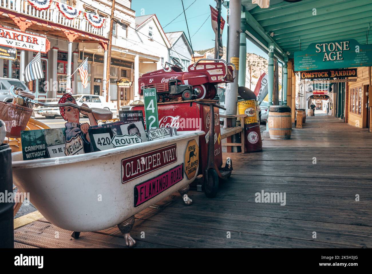 Old signs and symbols on objects outside shops in historic city on ...