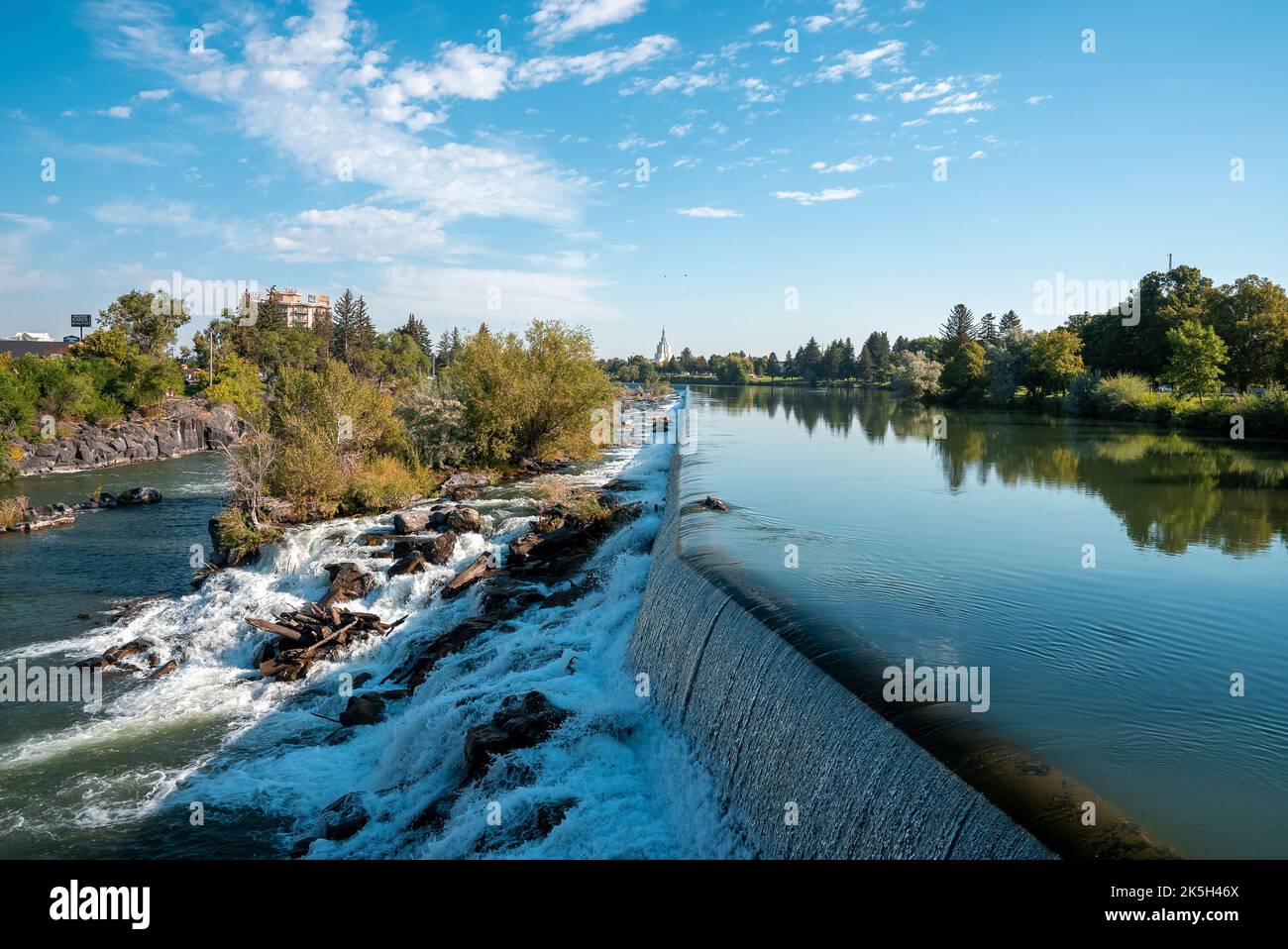 Beautiful Idaho waterfall meeting snake river near temple with sky in ...