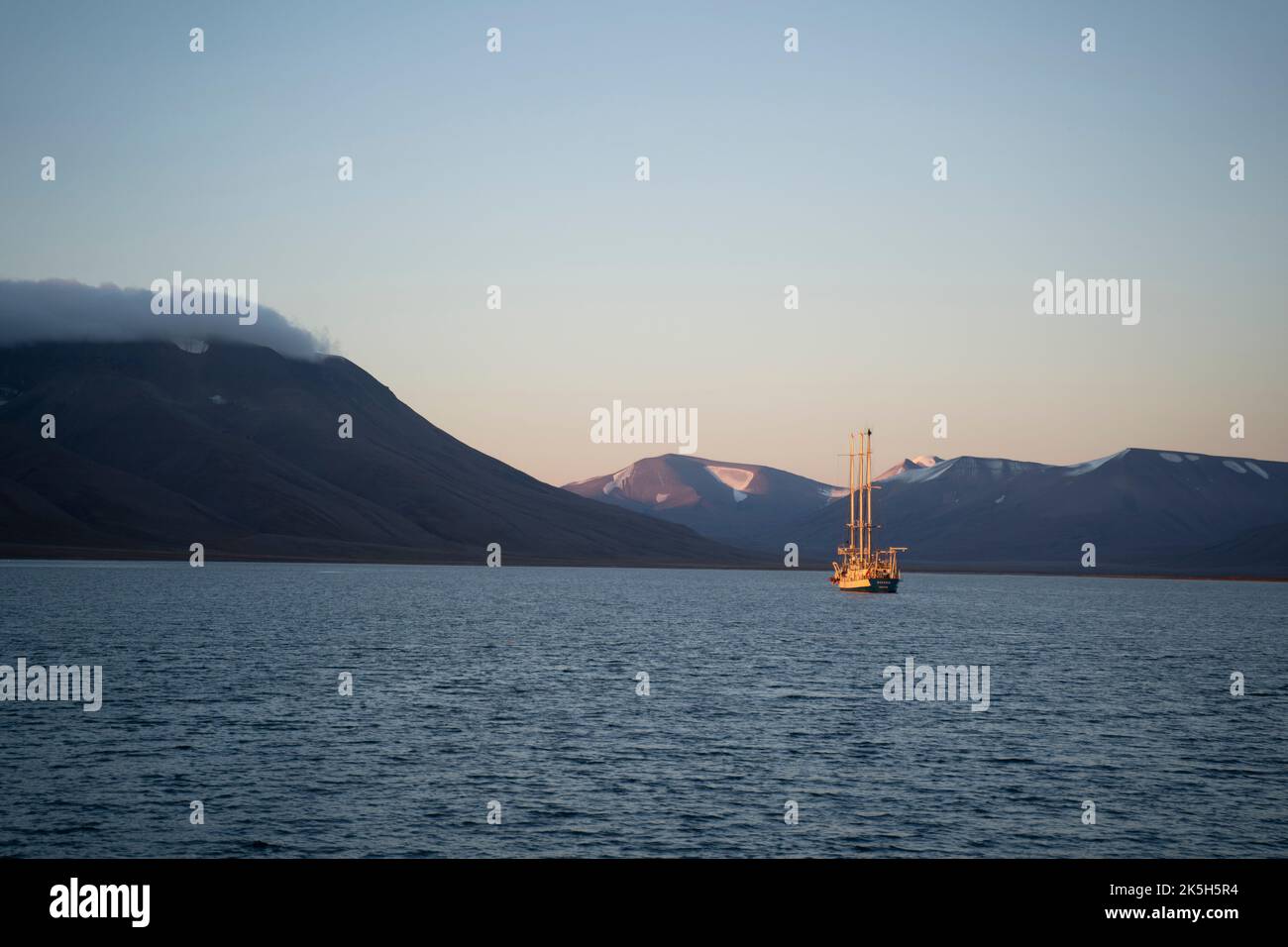three masted ship sailing the arctic waters of Svalbard Islands, Norway ...
