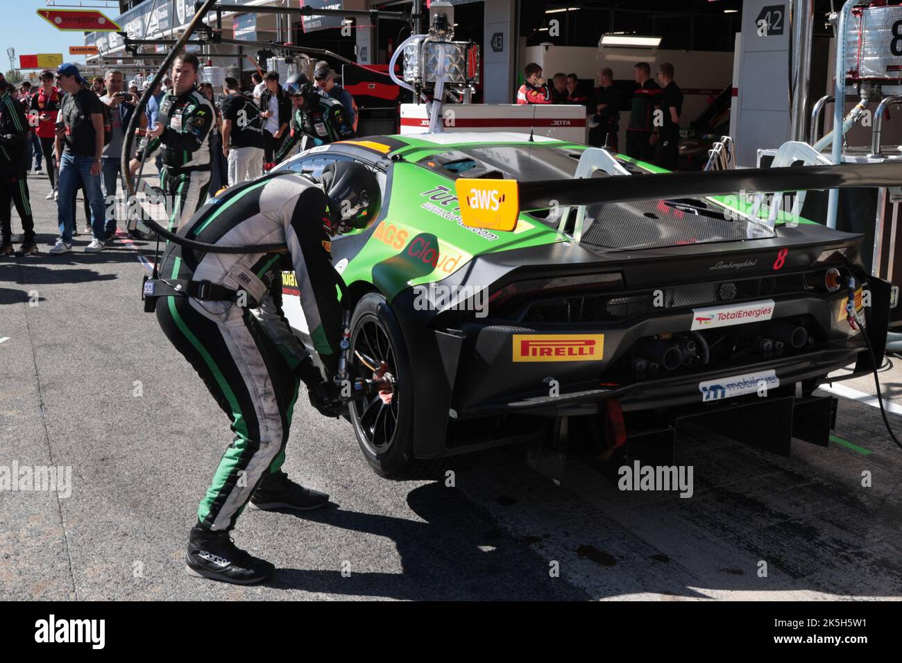1 October 2022 - Mechanics practising pit lane tyre change at the ...