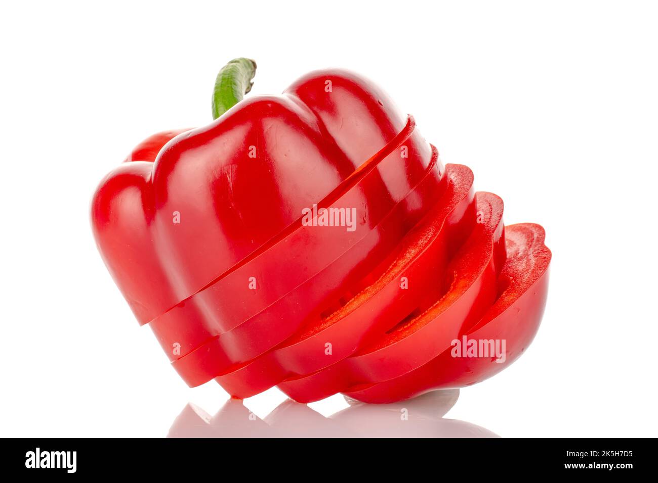 Red bell pepper cut into slices, close-up, isolated on white Stock ...