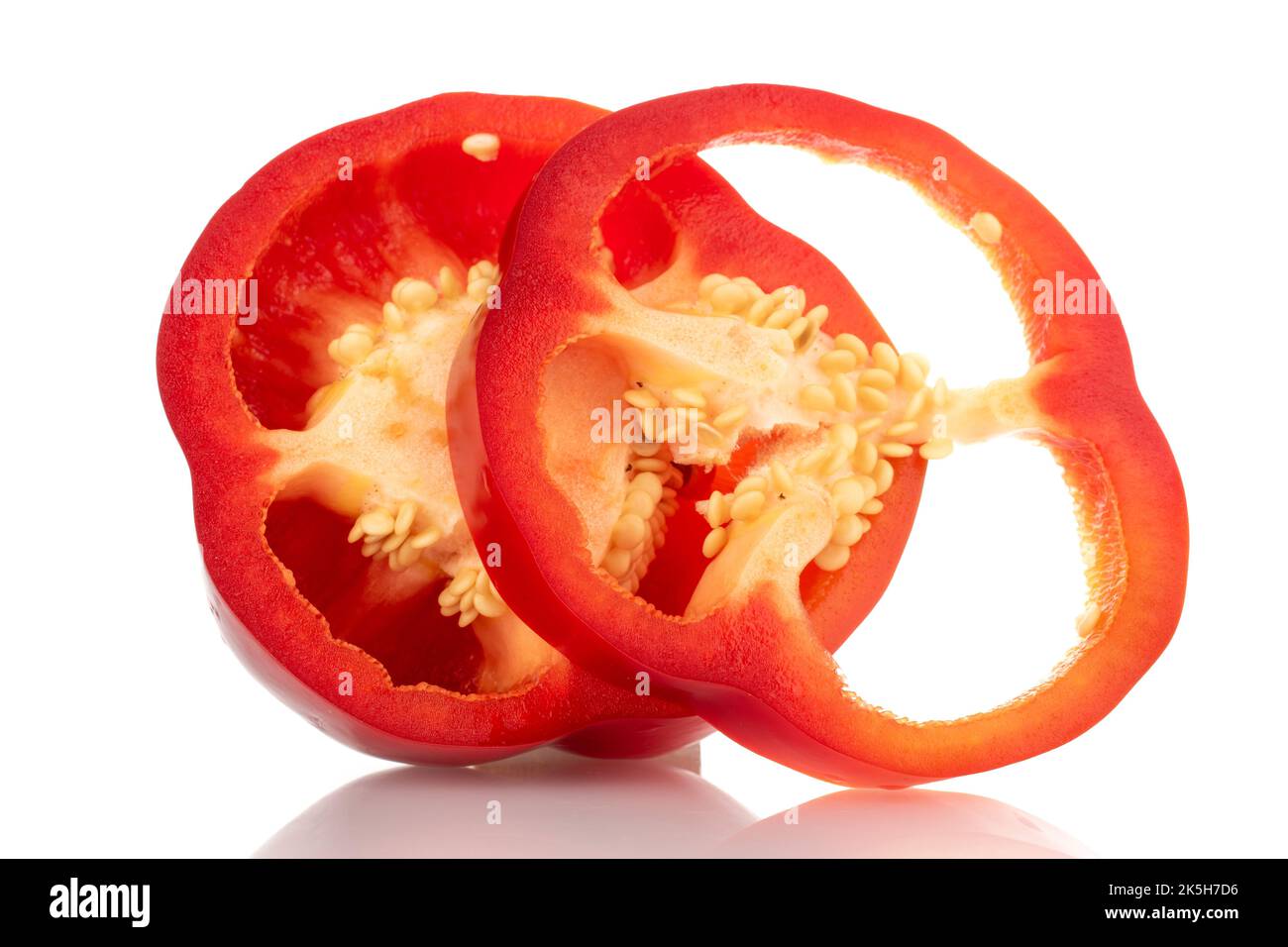 Red bell pepper cut into slices, close-up, isolated on white Stock ...