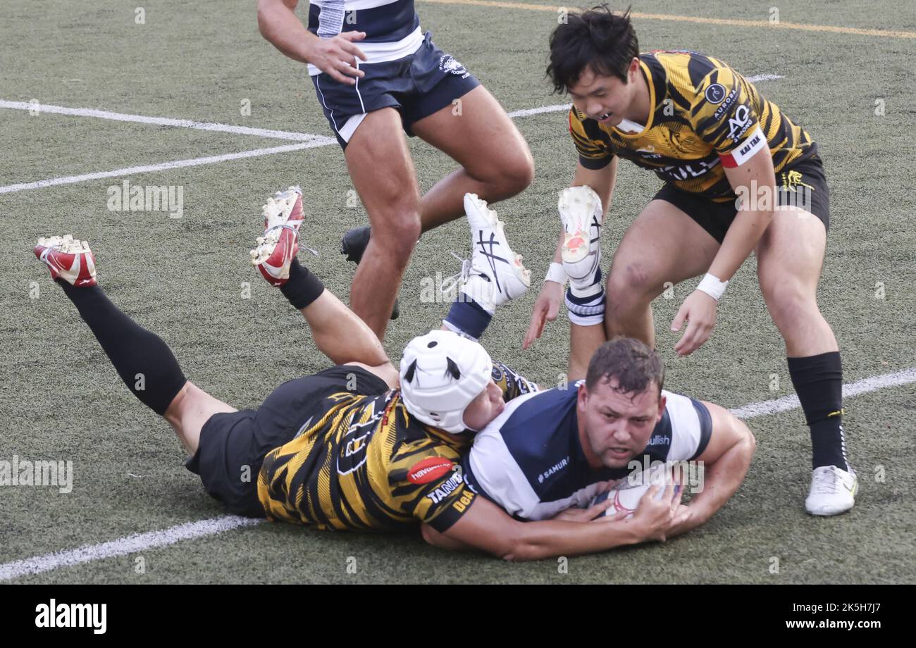 Super Saturday Rugby between HKFC (white and blue stripes) and USRC ...