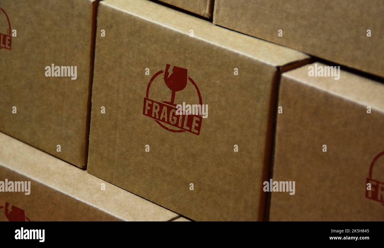 Fragile stamp printed on cardboard box. Careful shipping and handle ...