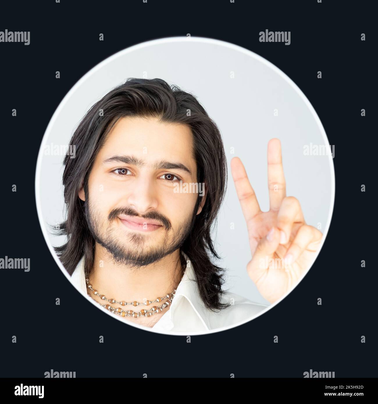 Happy man. Positive greeting. Attractive male portrait. Victory gesture ...