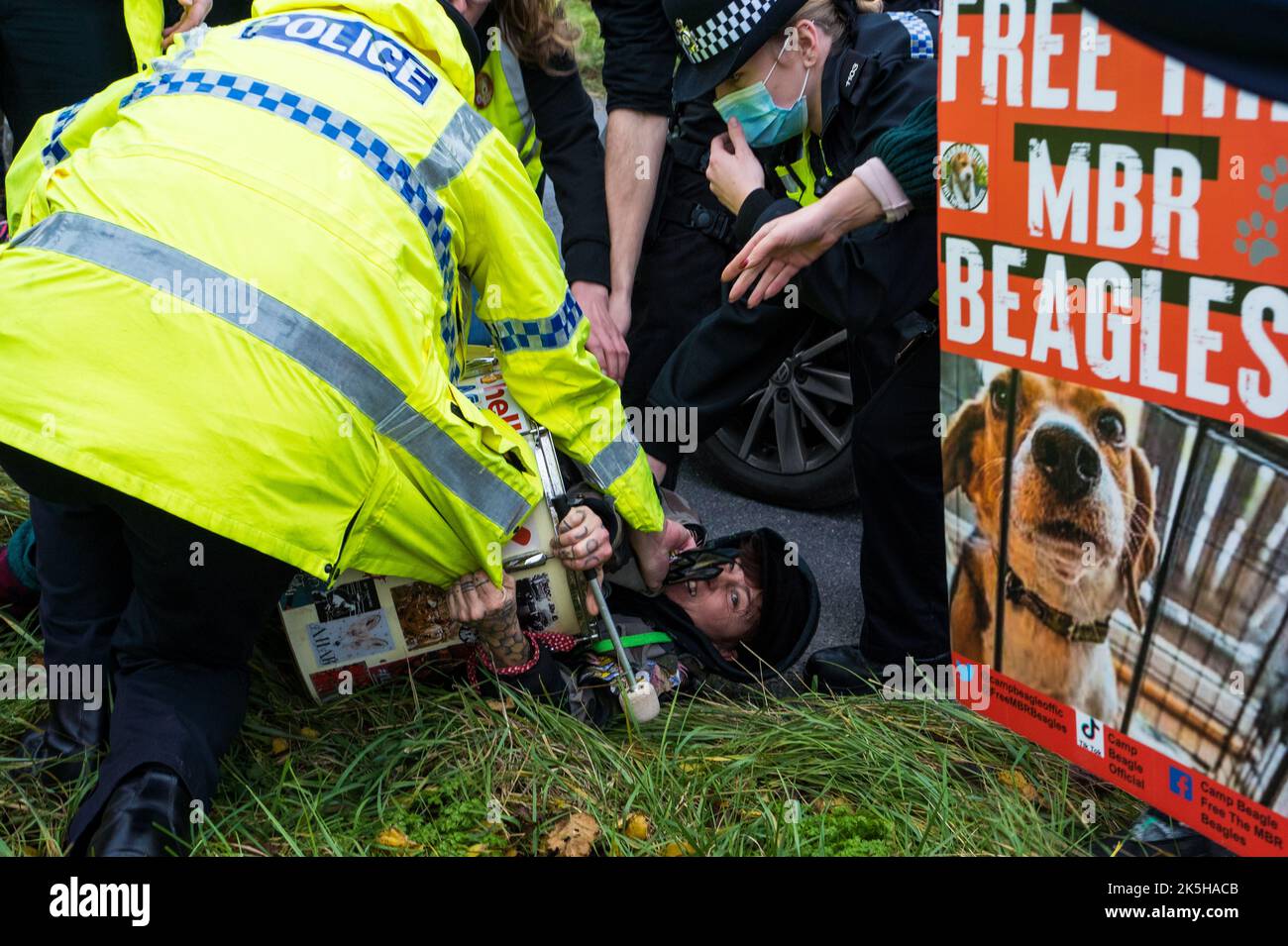 Police clash with demonstrators outside MBR Acres, a research facility ...