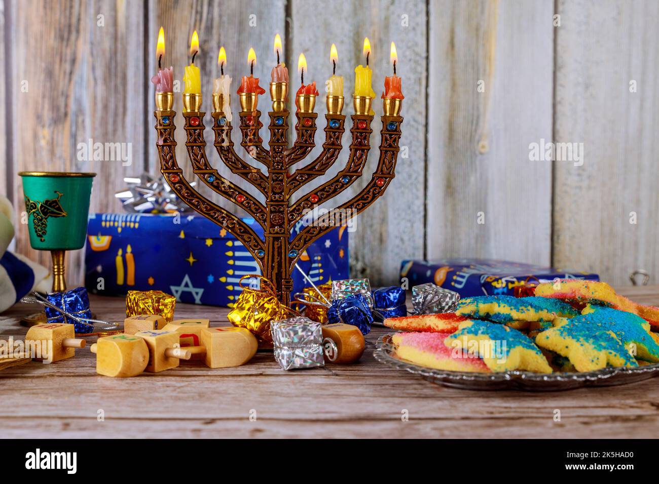 In preparation for Hanukkah festival, Jews light candles in their ...