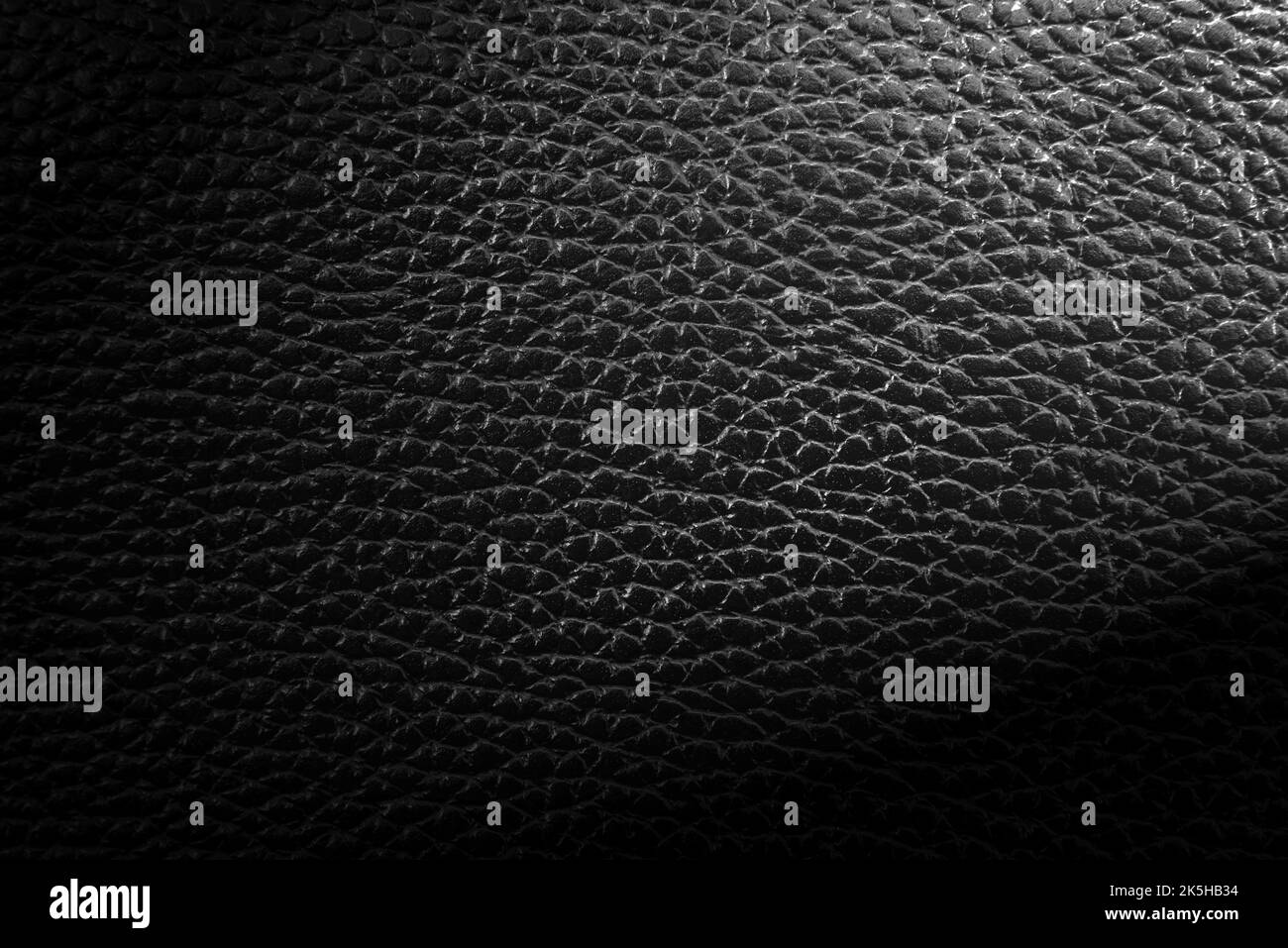 Black leather texture. Abstract background of dark leather with small ...